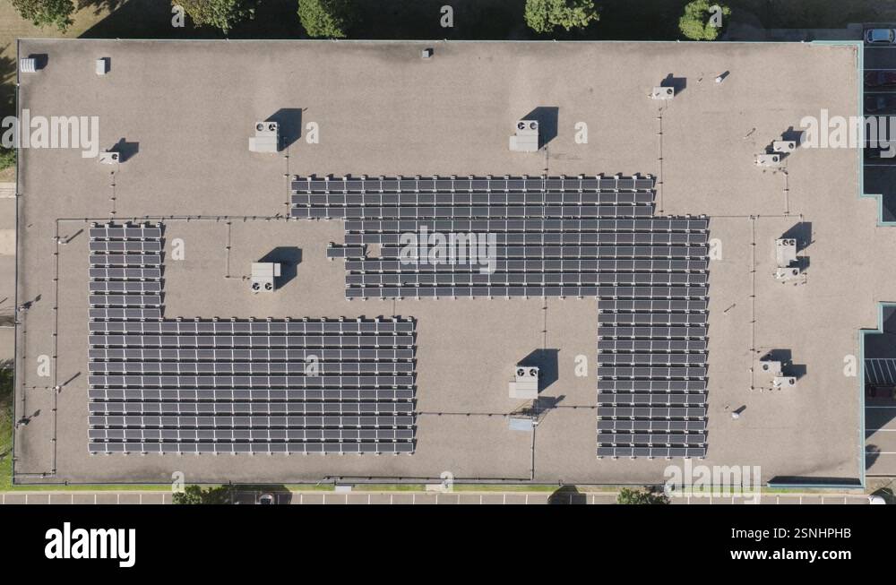 Top-Down Drone Footage of Solar Panel Layout on Commercial Building ...