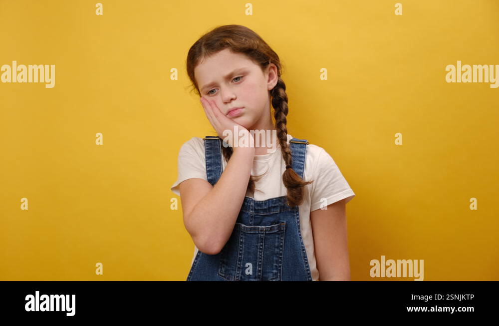 Portrait of sad preteen girl child put hand on face facepalm epic fail ...