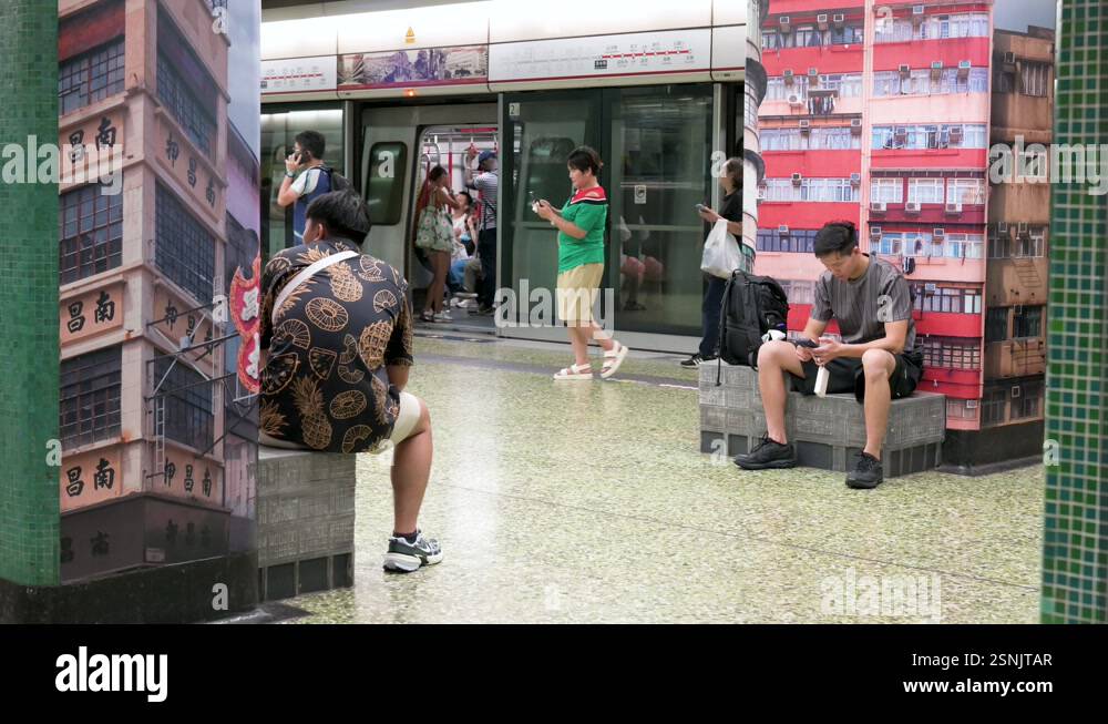 Commuters Exiting Subway Train at Station Platform, People Sitting on Bench Stock Video Footage ...