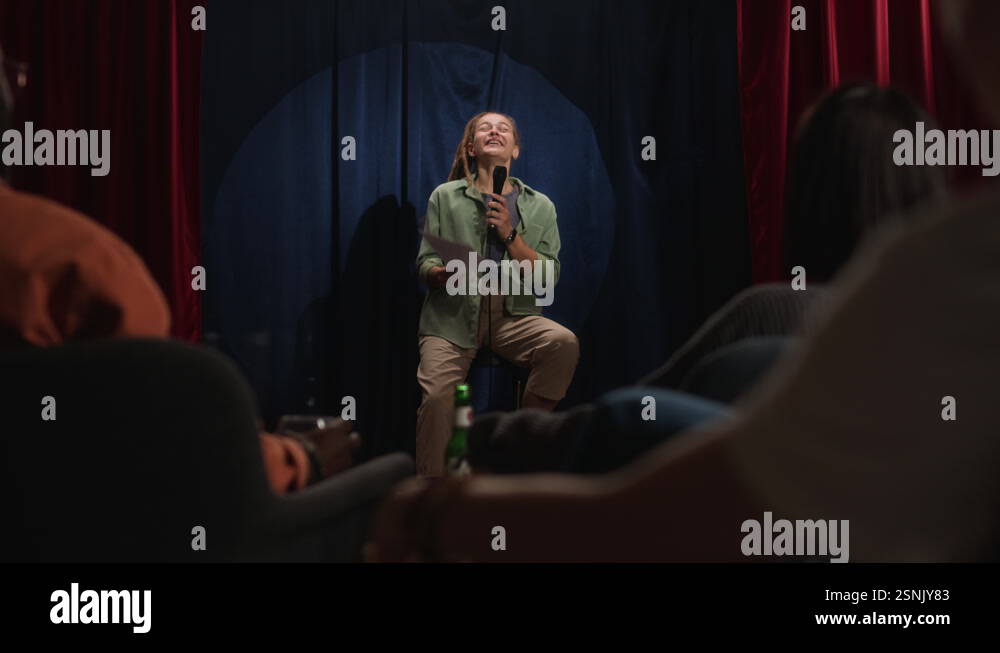 Spectators Watching Female Stand-Up Comedian with Dreadlocks Telling ...