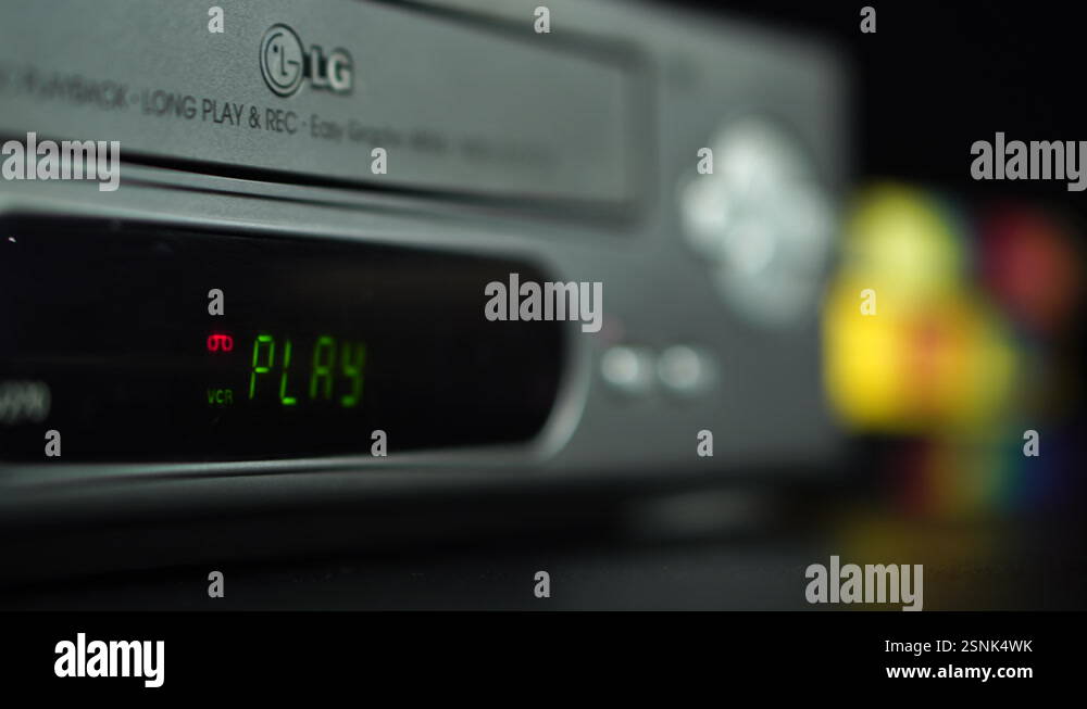 Inserting VHS Videotape and Pressing Play Button on VCR, Close Up Stock ...