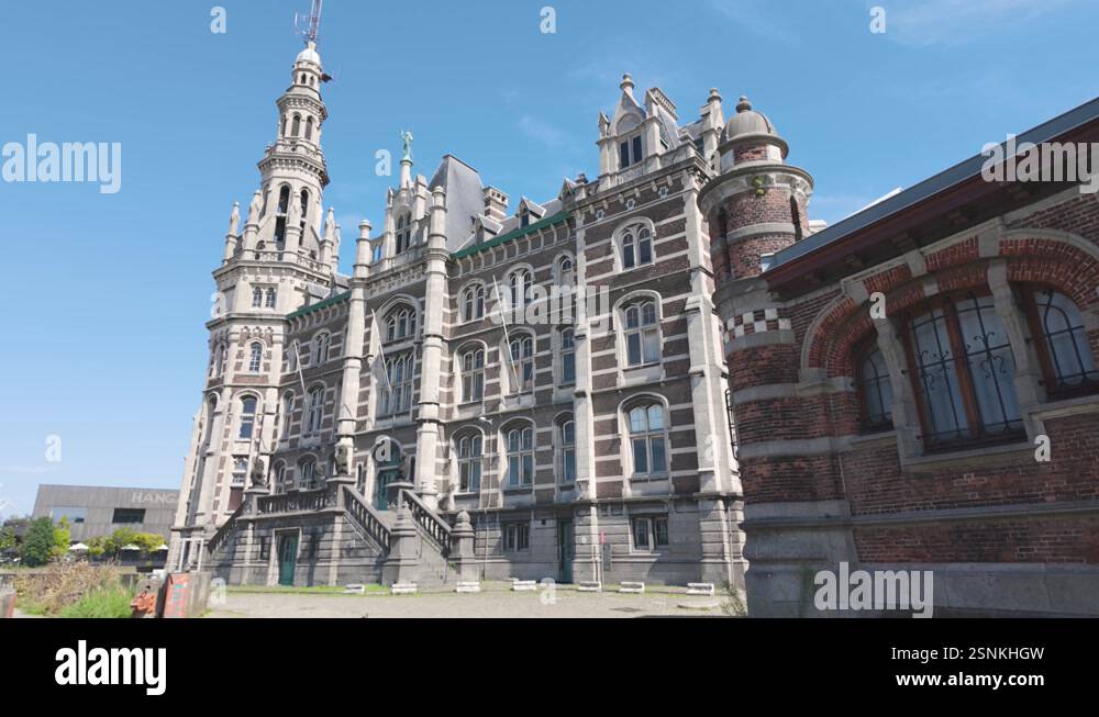 Historic architectural details of the Loodswezen building under a ...