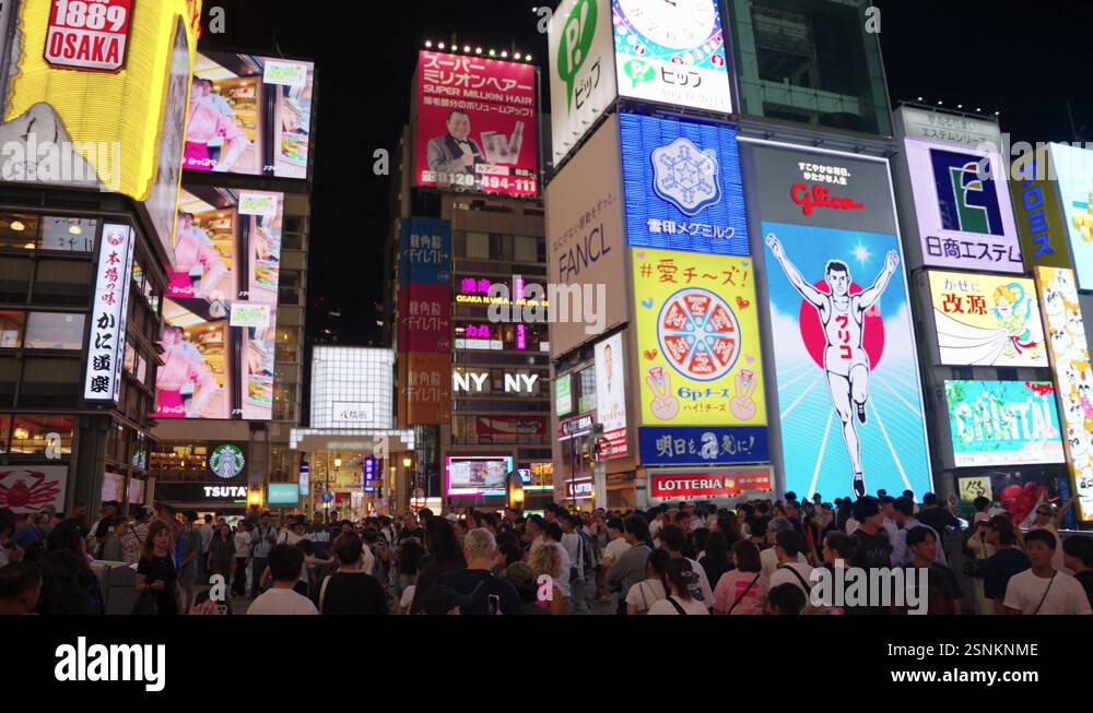 Slow motion pan, Overtourism in Japan during Summer Season at Dotonbori ...
