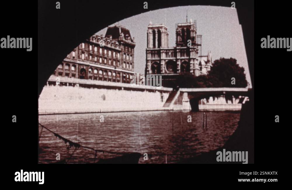 1960s: Notre Dame and the Seine. Parisian streets and rooftops. Vincent ...