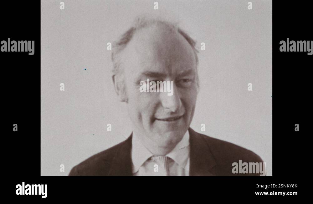 1960s: Photograph of Dr. Francis Crick. Model of DNA nucleotides. Man points at Stock Video ...