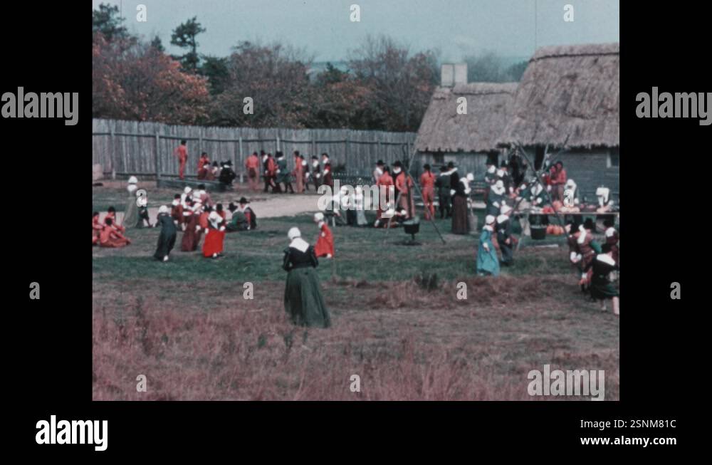 1960s: Native American man shoots arrow as crowd looks, colonial ...