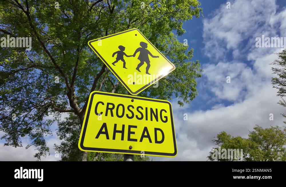 A retroreflective road sign for warning children crossing ahead in ...