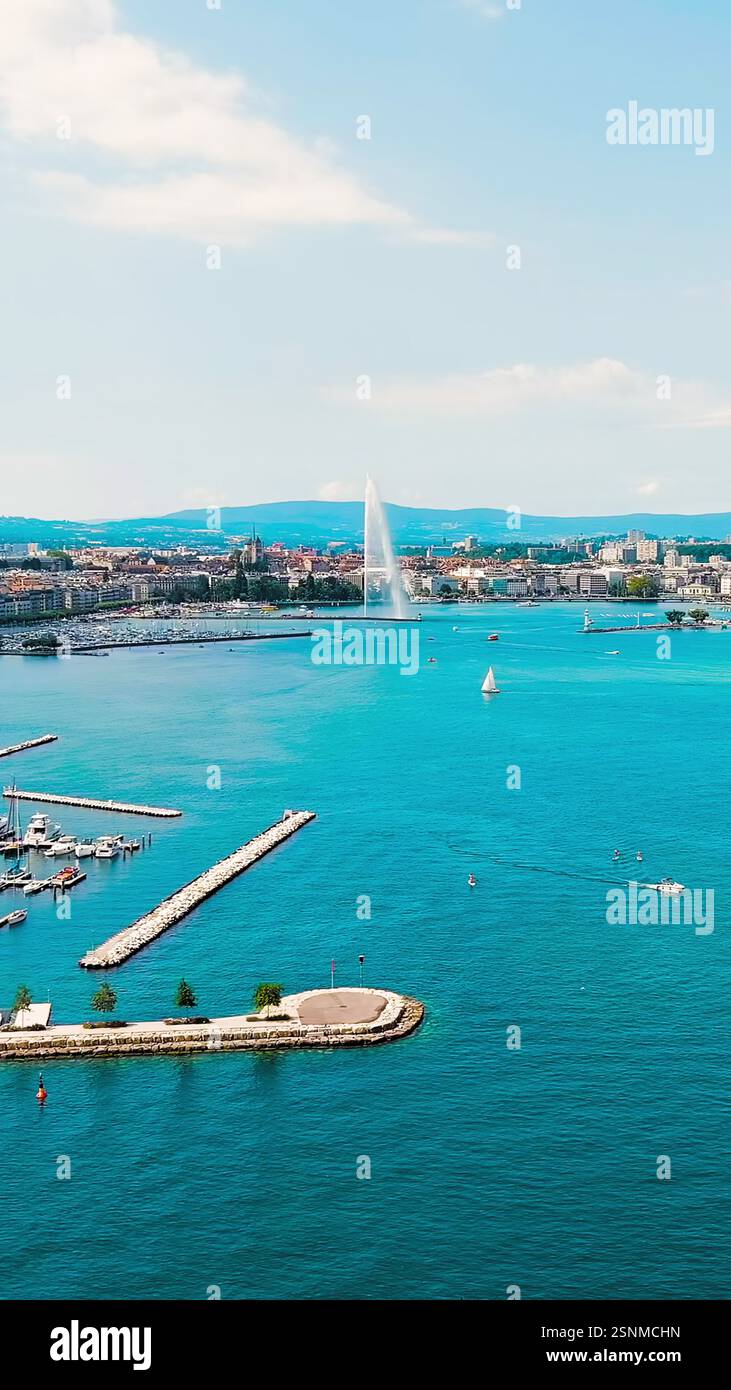 Vertical video. Geneva, Switzerland. Fountain Je-Deau. Large fountain ...