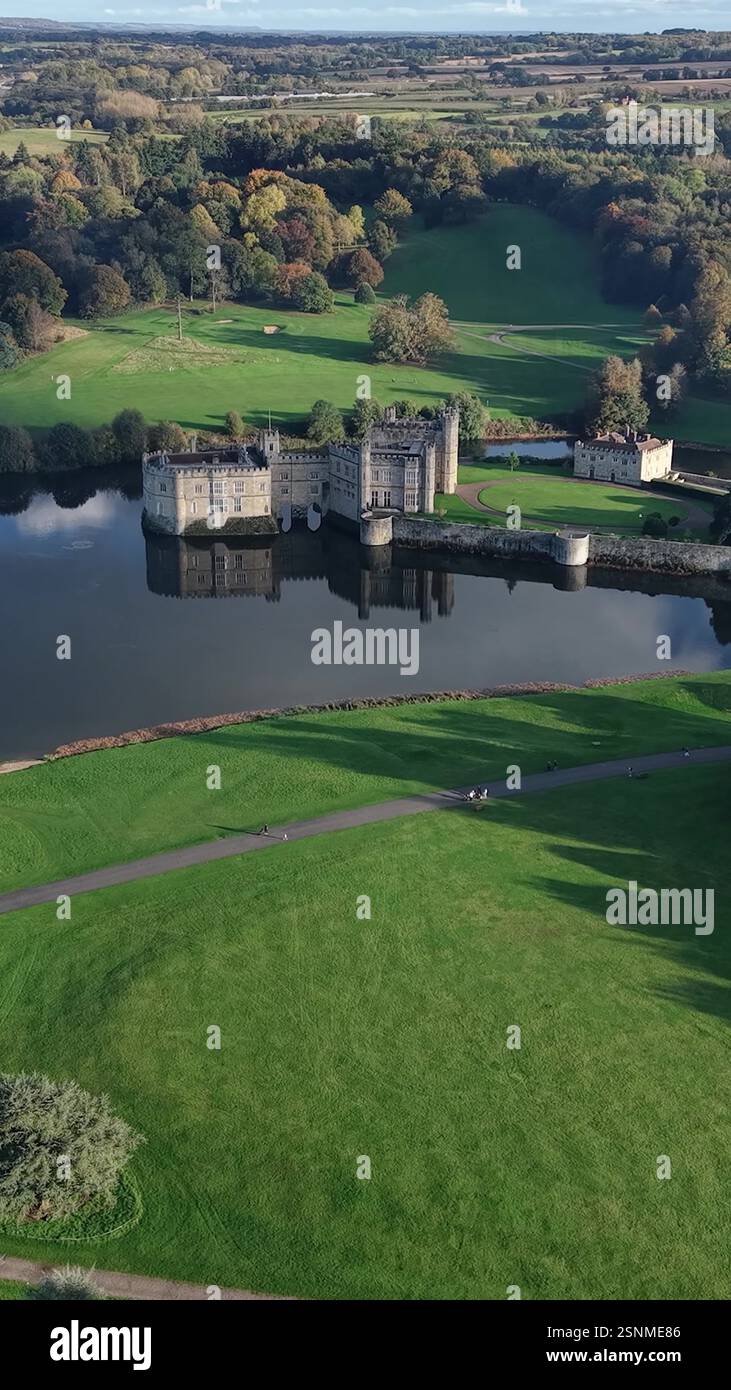 Vertical View Of Leeds Castle With Reflection On Moat Water In Kent ...