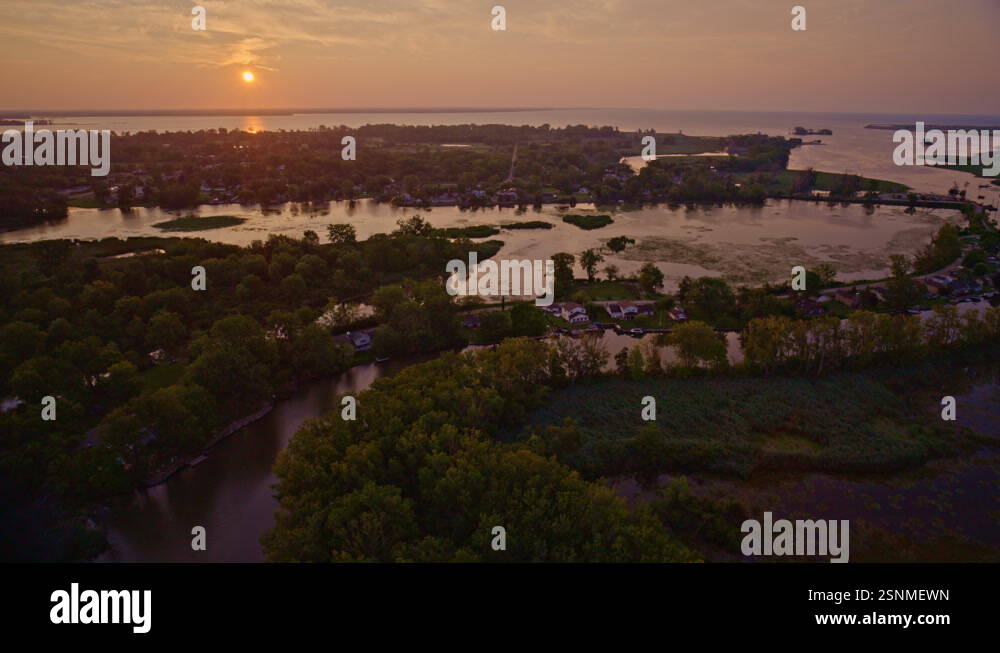 Flying above the Huron River's mouth at Lake Erie, near Hull's Trace in ...