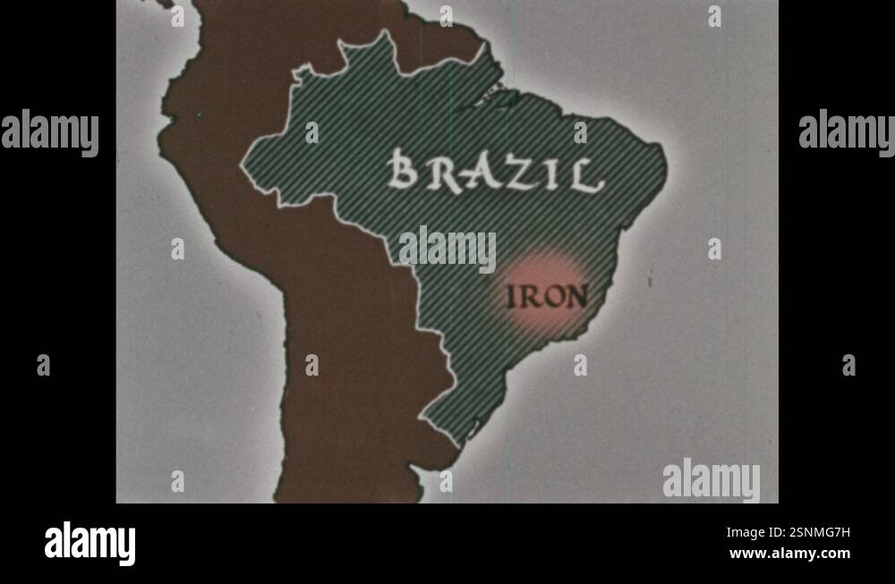 1960s: City. Train. Factory. Map. Steam shovel dumps load in back of ...