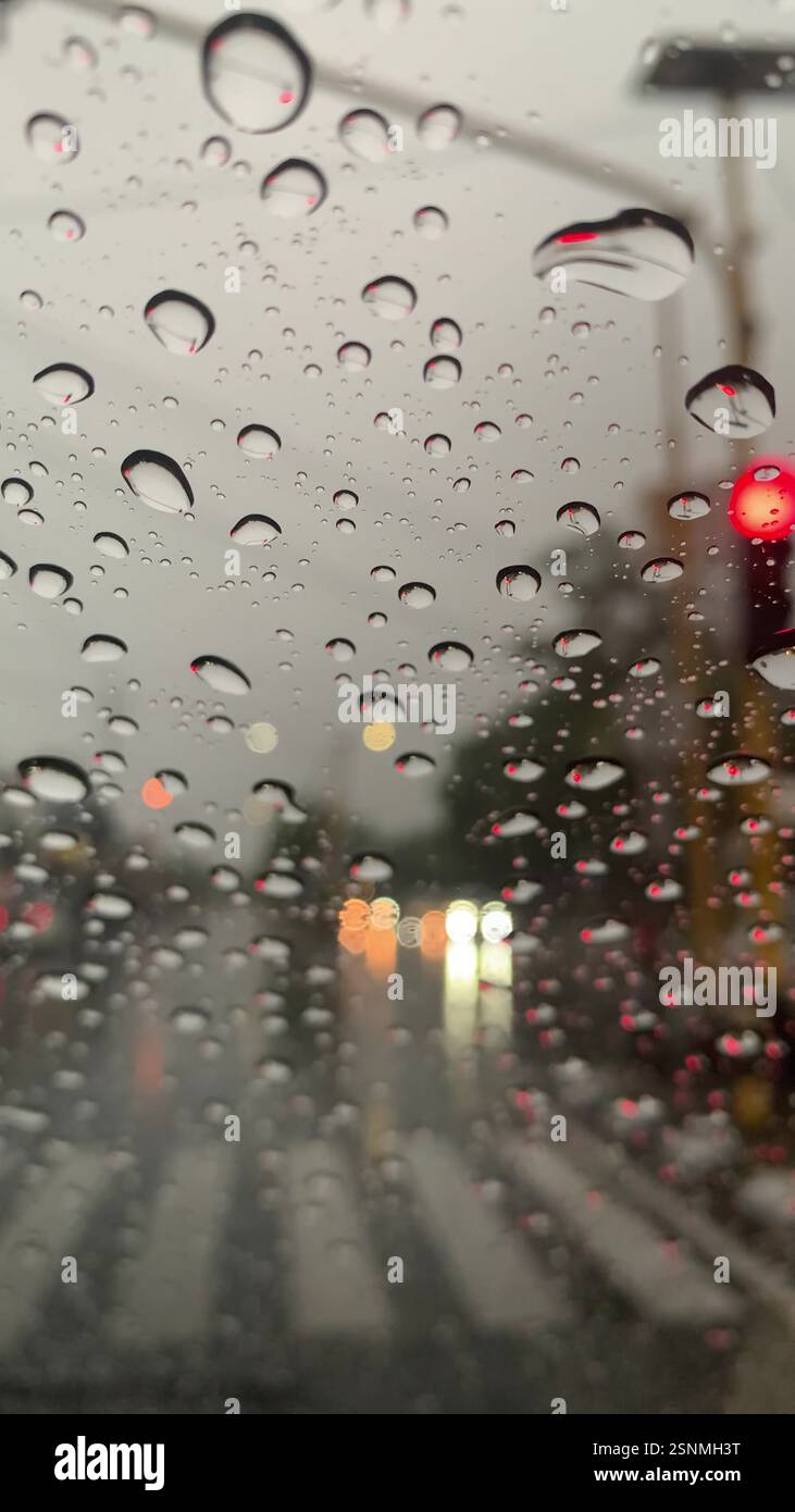 Raindrop on the window of the car. Portrait orientation for reels Stock ...