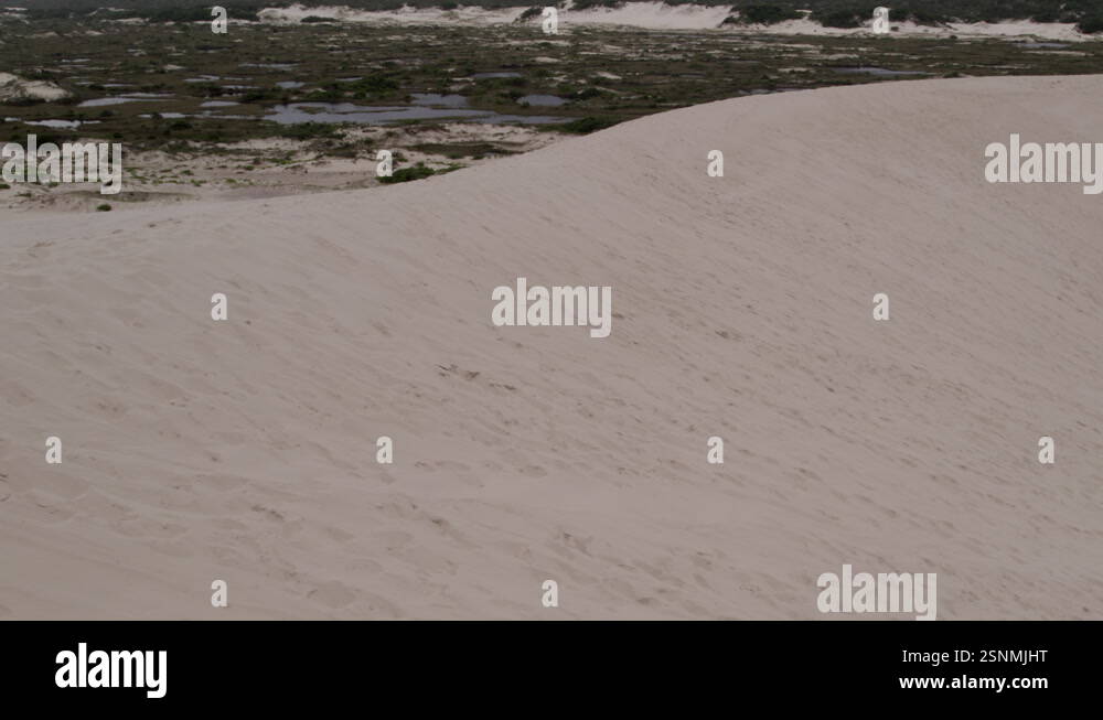 Crest of sand banks in front of isolated beach Stock Video Footage - Alamy