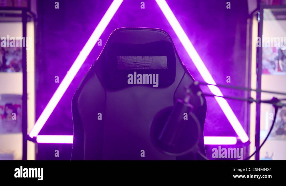 Empty gaming chair with mic template in pink neon light cyberspace with ...
