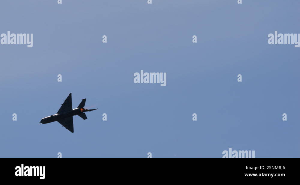MiG-21 Fighter Jet Flying Showcasing Iconic Delta Wing Design from Cold ...