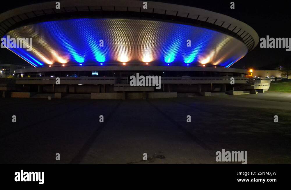 Illuminated Spodek arena in Katowice city during autumn dark night - 4K ...