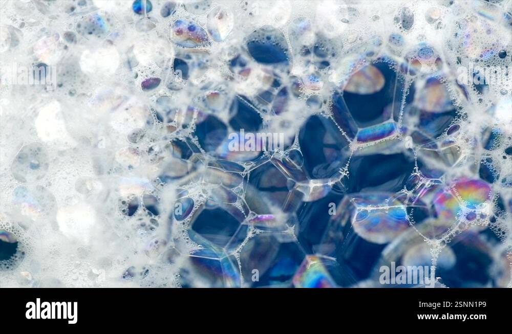 Foam bubbles background. Liquid soap bubbles, Froth bubbles rotating ...
