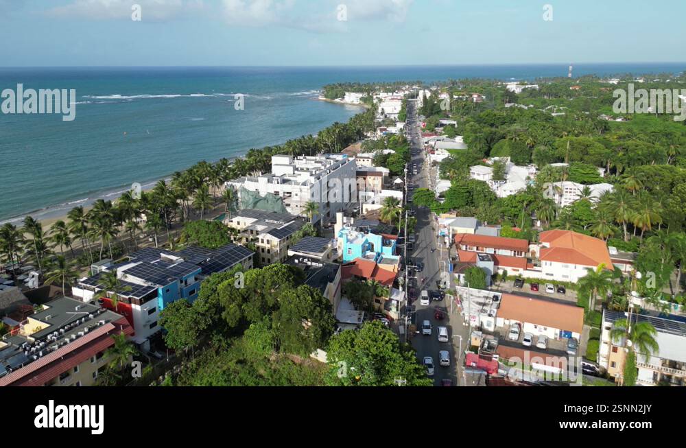 Aerial view of the main road and beach in the resort town Cabarete on ...