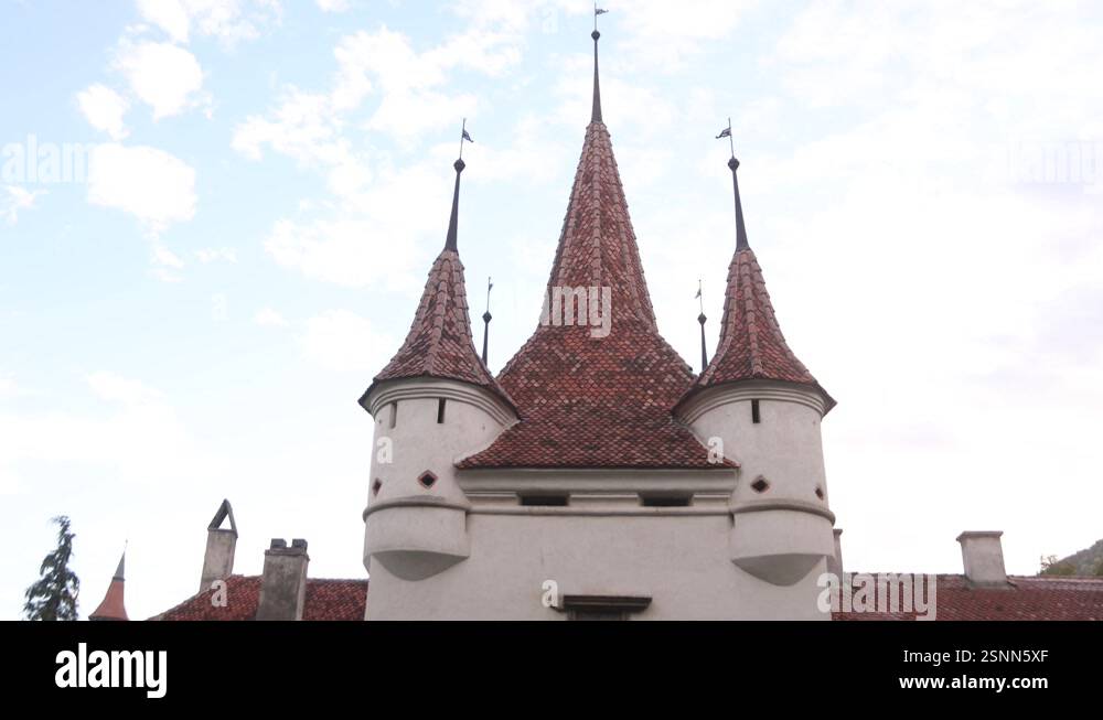 Tilt Up View Of Top Roof And Turrets Of Old Medieval Castle In Brasov ...