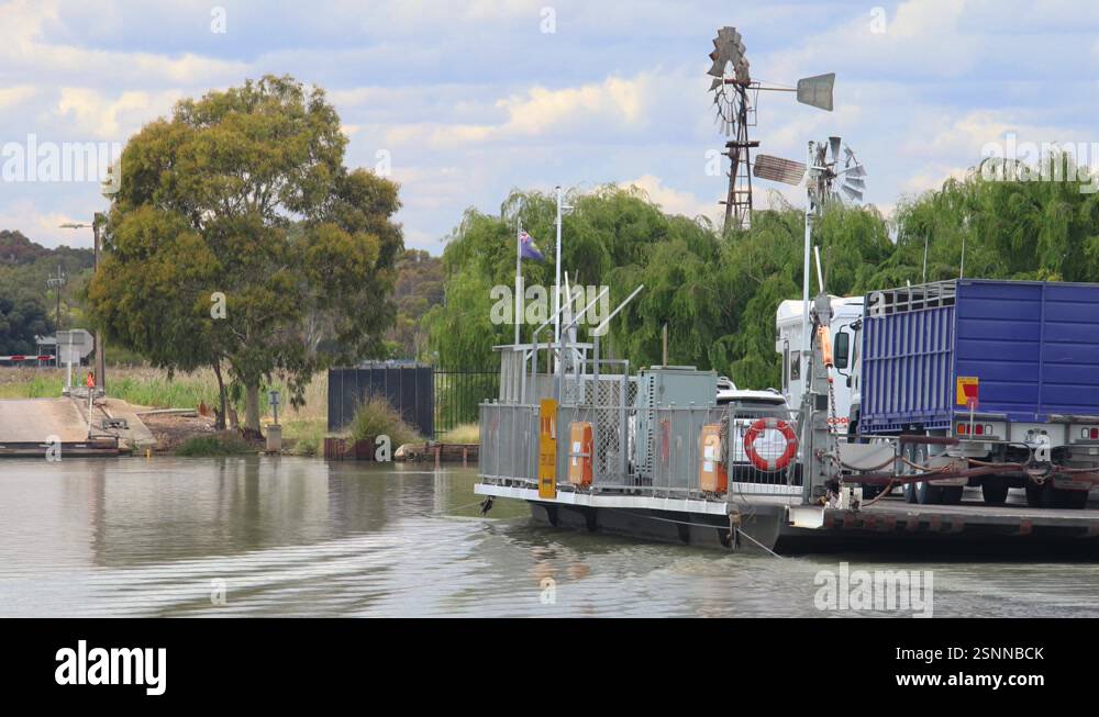 Cable Ferry Crossing the Murray River with Windmill and Weeping Willows ...