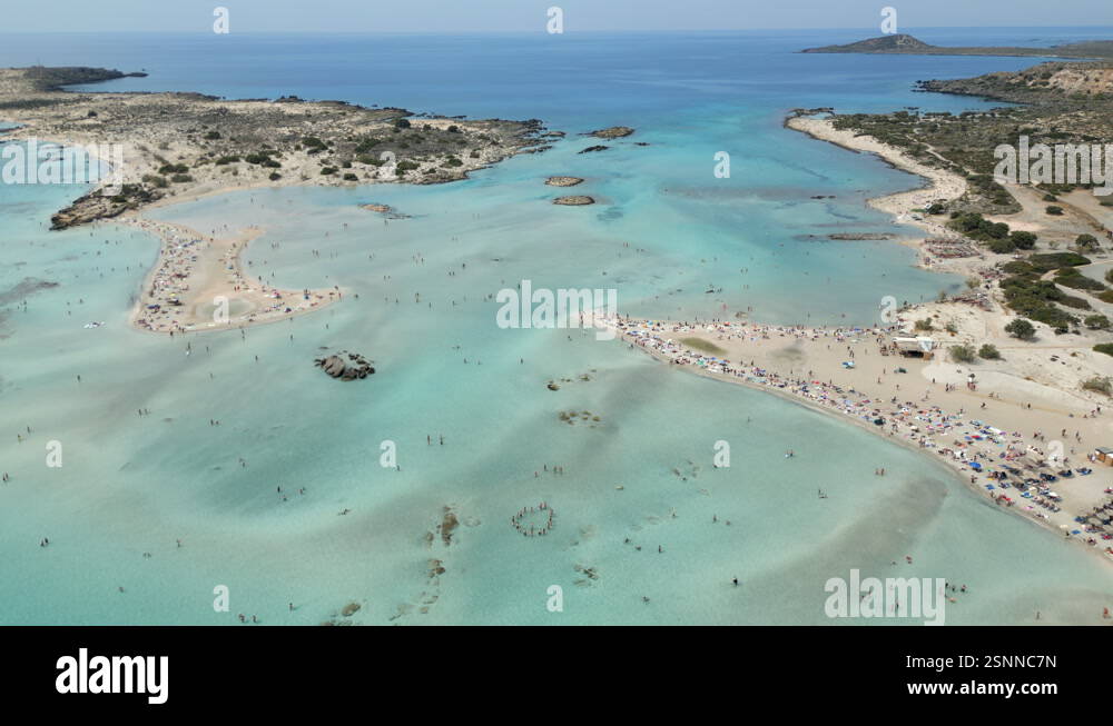 Tourists Standing In Water At Elafonissi Beach Crete Drone Pull Back 4K ...