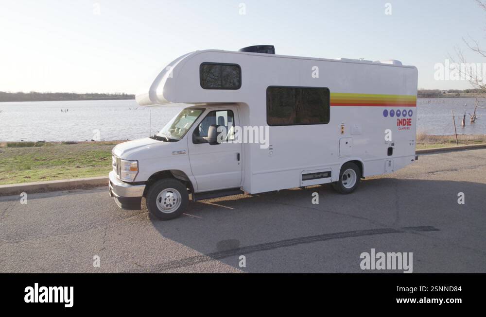 Indie Campers Rental RV Parked By the Reservoir Shore at Bell Cow Lake ...