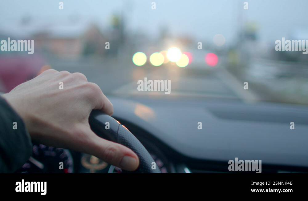 driver's hand control car, soft focus drivers hand firmly grips the ...