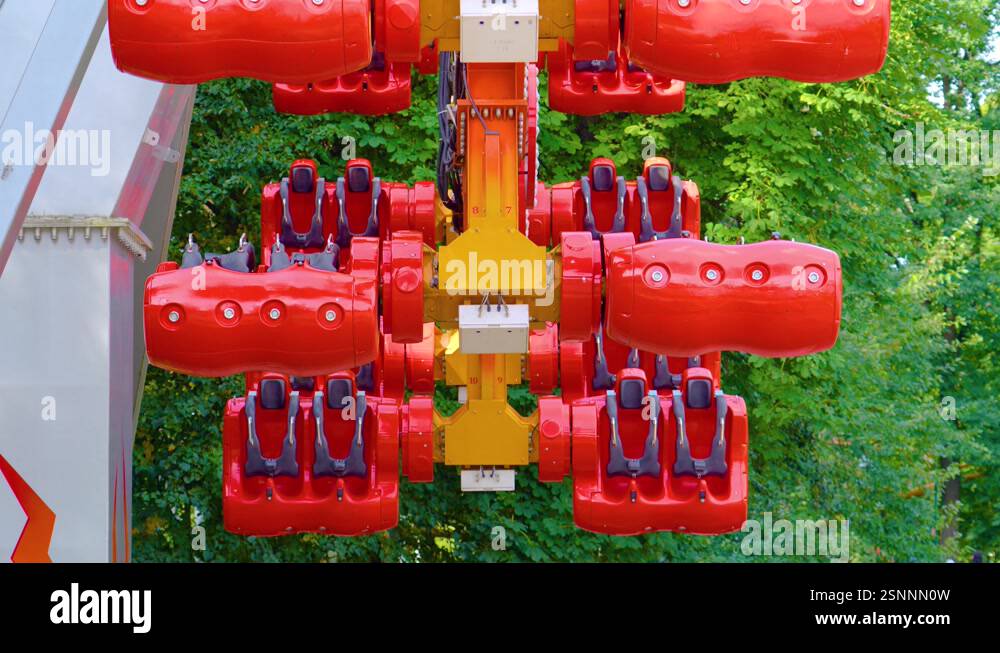 Empty red seats, extreme amusement park attraction rotation Stock Video ...