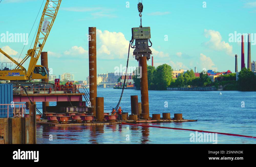 Crane XCMG building bridge. Installation pile support Stock Video ...