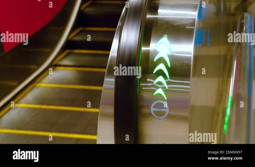 Escalator handrail movement of stairs up indicator of shining ...