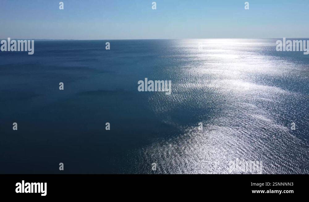 Deep blue sea. Aerial drone view of sea waves. Sun reflection on water ...