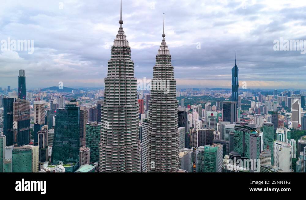 Aerial top panoramic climb take off view frame shot panorama Petronas ...