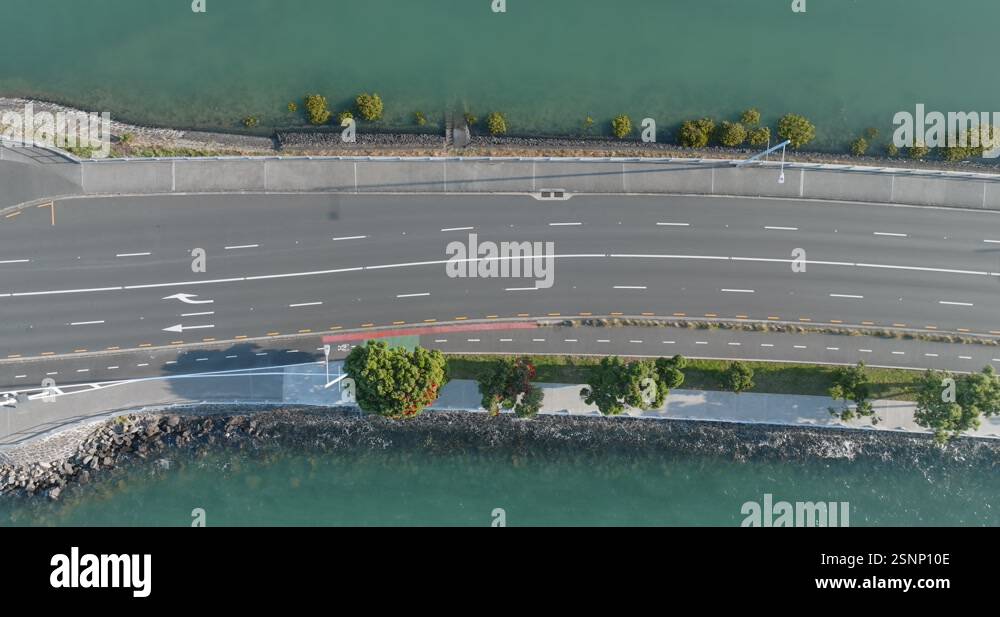 Coastal road with bike path, cars visible. Tamaki Dr, Hobson Bay ...