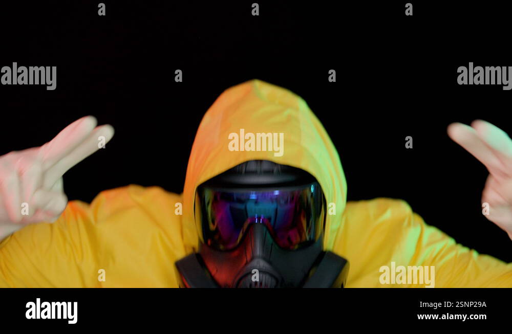 Cyberpunk person in yellow hazmat suit and gas mask dancing with ...