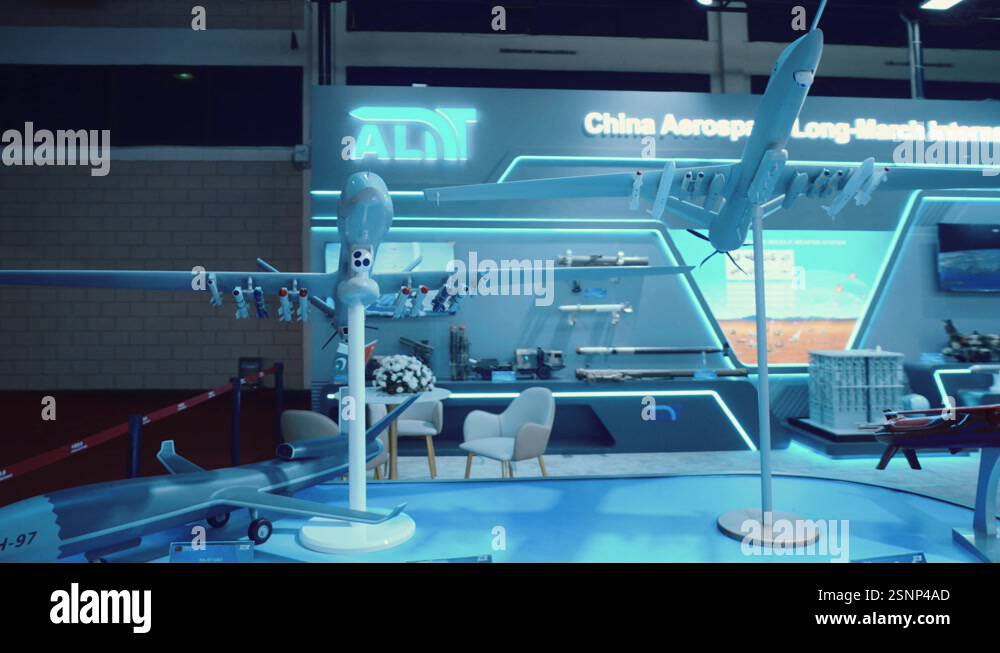 Aerospace Exhibition Booth With UAV Models and Technology Displays Stock Video Footage - Alamy