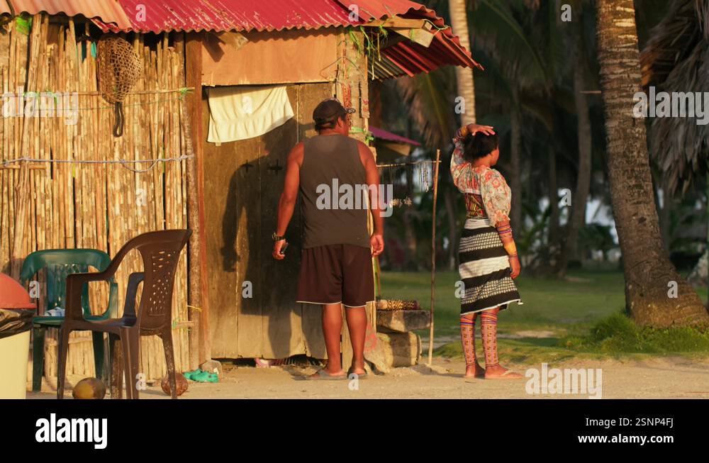 Indigenous Kuna Yala Family in Front of Their Traditional House During ...