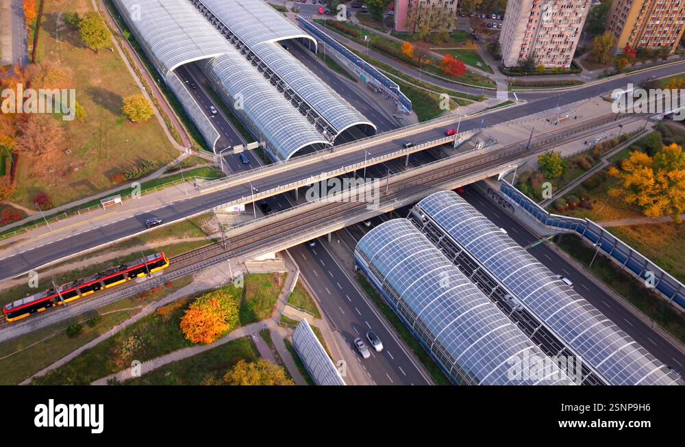 Electric tram crossing through a bridge, Trasa Torunska motorway ...