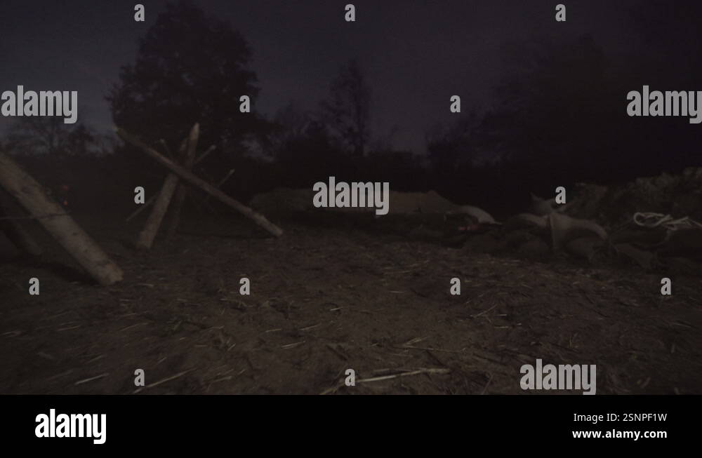 World war one soldier runs through dark trenches, navigating the ...