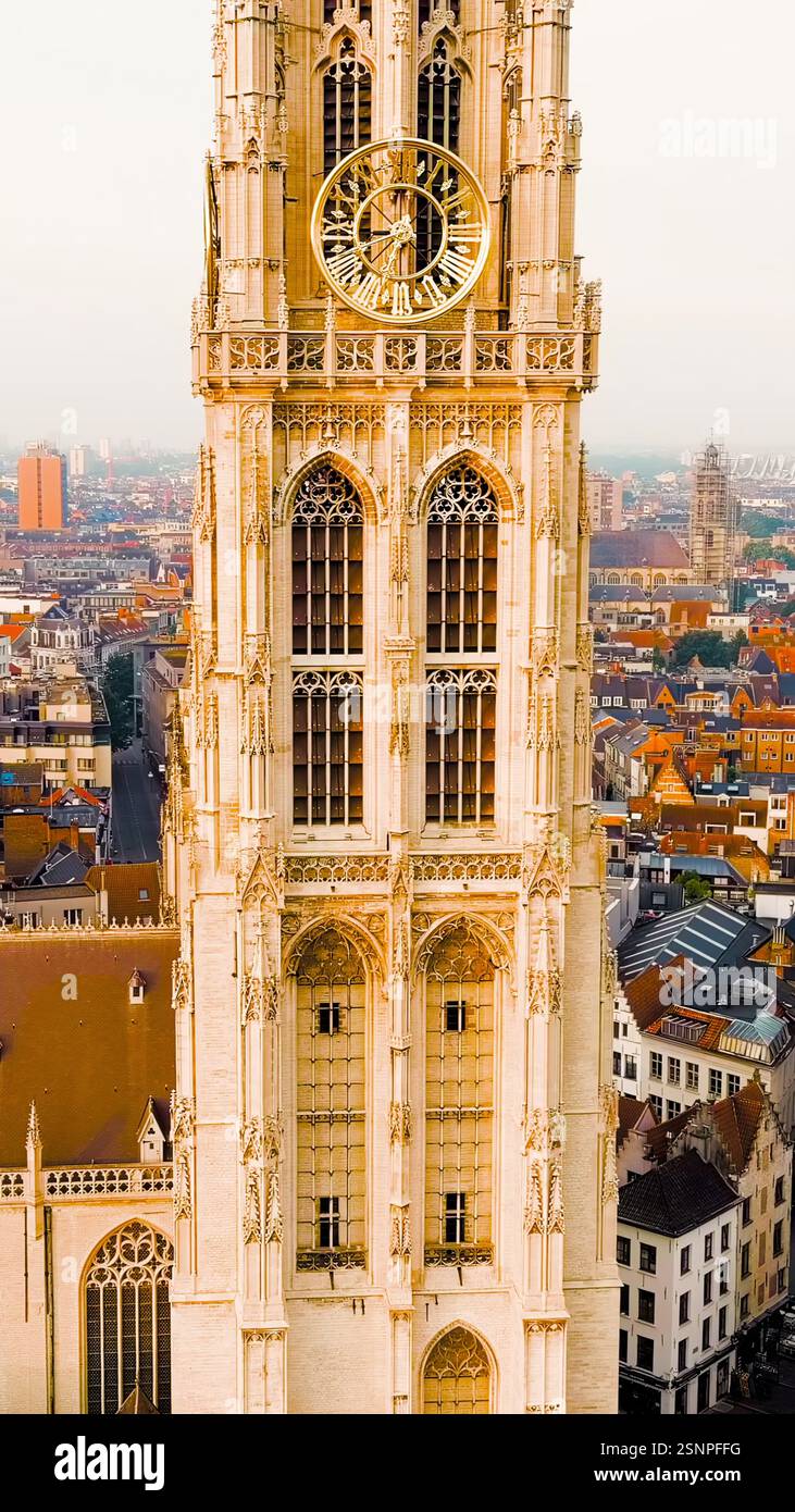Vertical video. Antwerp, Belgium. Spire with the clock of the Cathedral ...