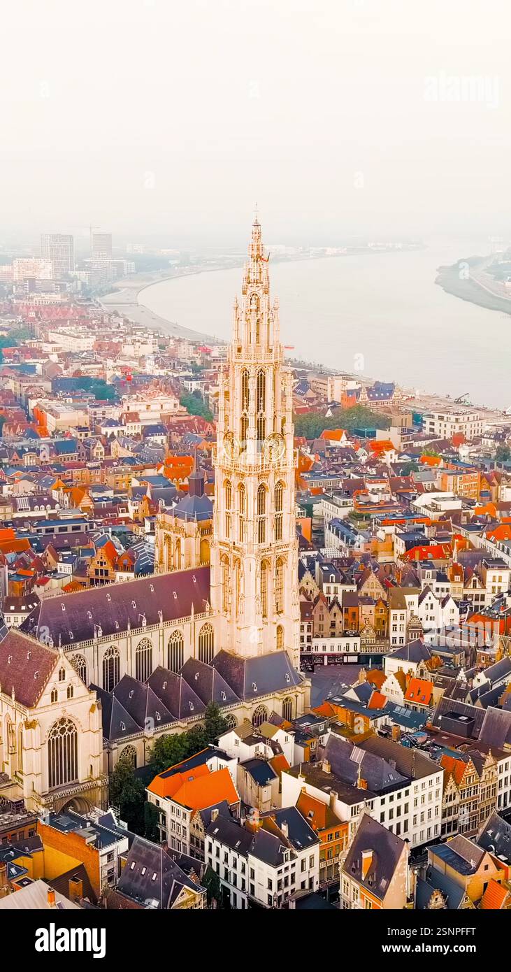 Vertical video. Antwerp, Belgium. Spire with the clock of the Cathedral ...