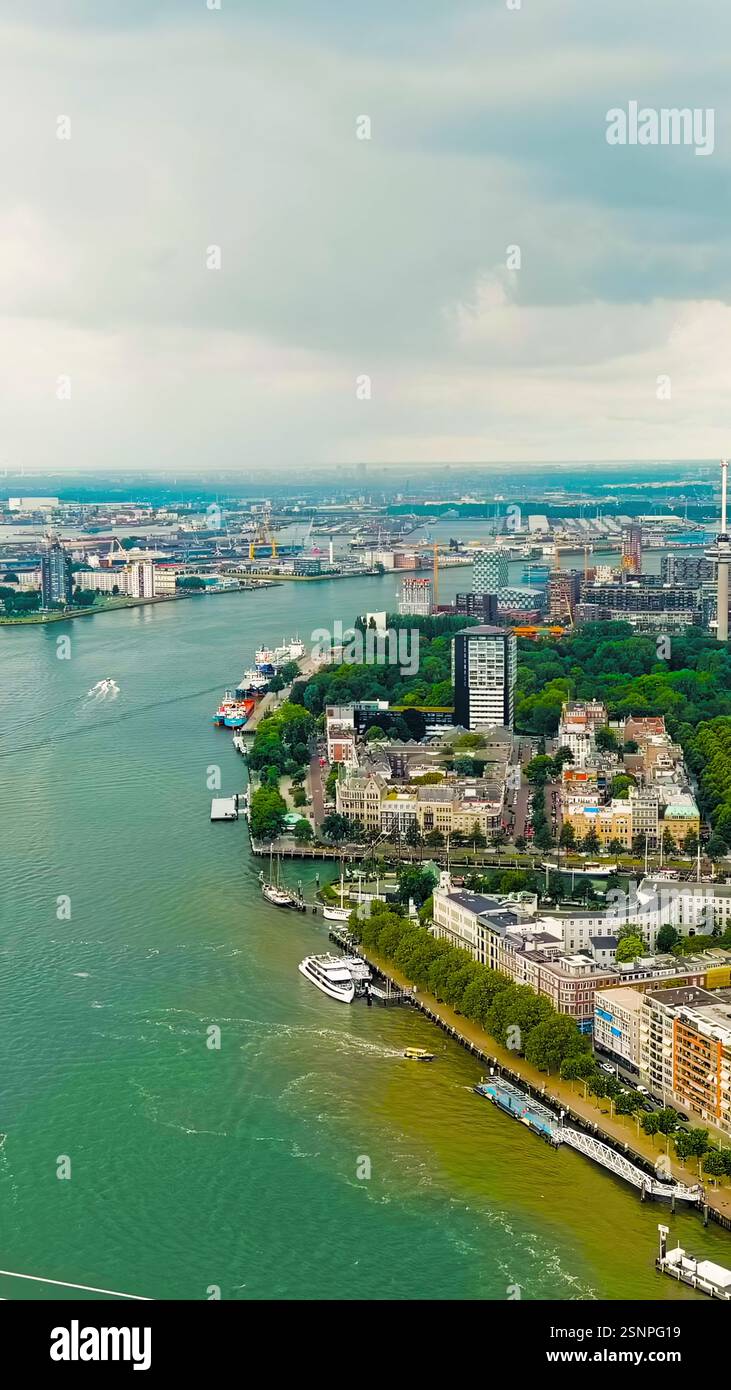 Vertical video. Rotterdam, Netherlands. View of the port. River Nieuwe ...