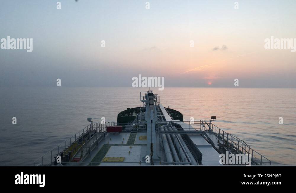 A gas carrier merchant ship underway, deck view Stock Video Footage - Alamy