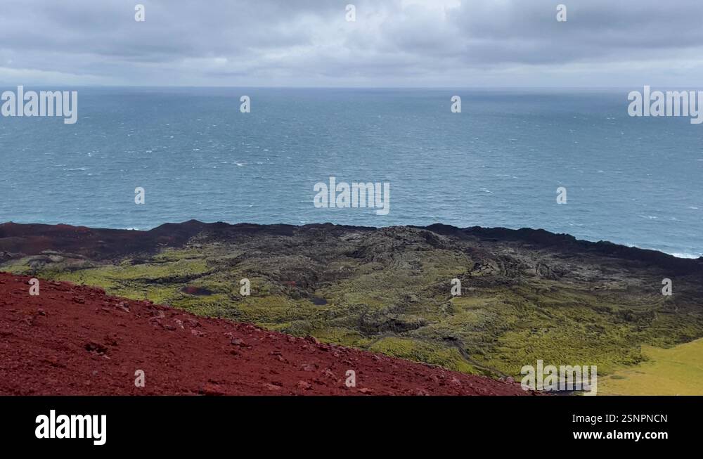 Ocean horizon view from volcano at Iceland’s Vestmannaeyjar on cloudy ...