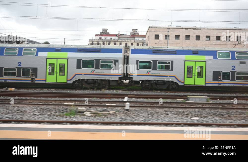 Travel by train. A modern express train enters the railway station ...