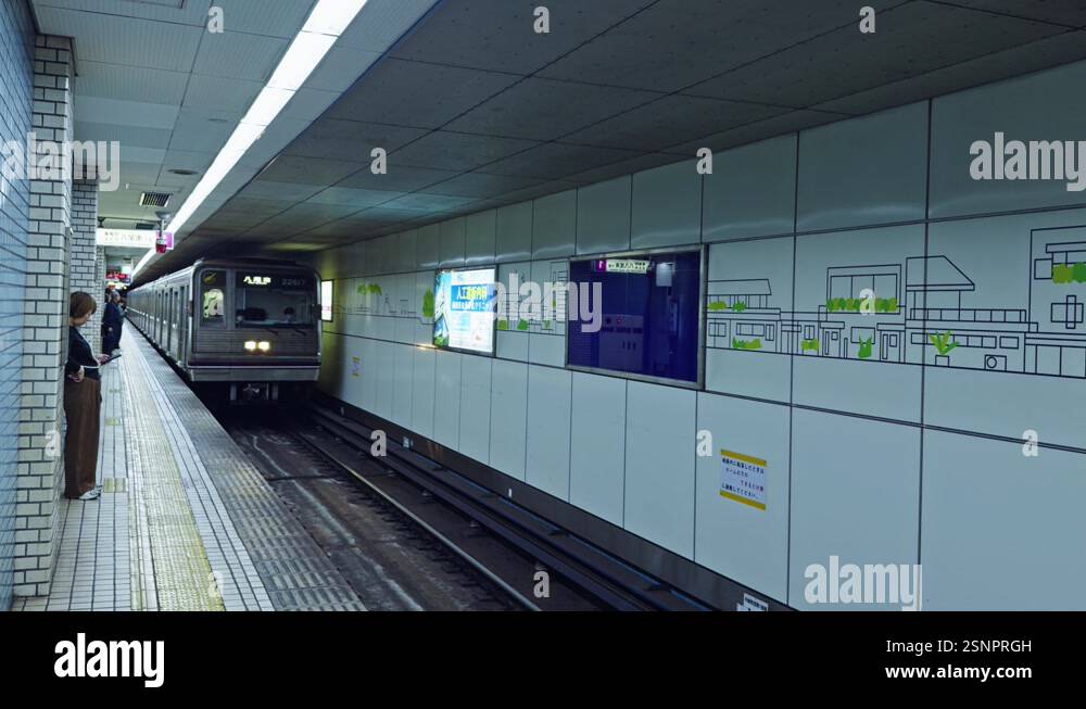 Tanimachi Line Subway Train Arrives at Underground Station, Osaka Metro ...