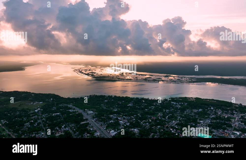 Bacalar lakeshore town with stunning sunset, Quintana Roo, Establishing ...