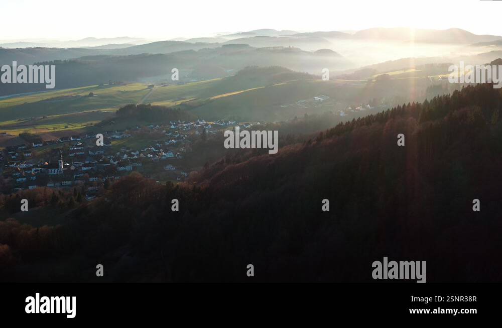 the landscape of the german sauerland in the evening from above 4k ...