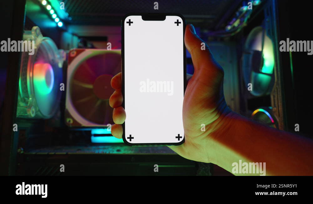 Vertical Smartphone With White Screen And Markers Held Against RGB-Lit ...