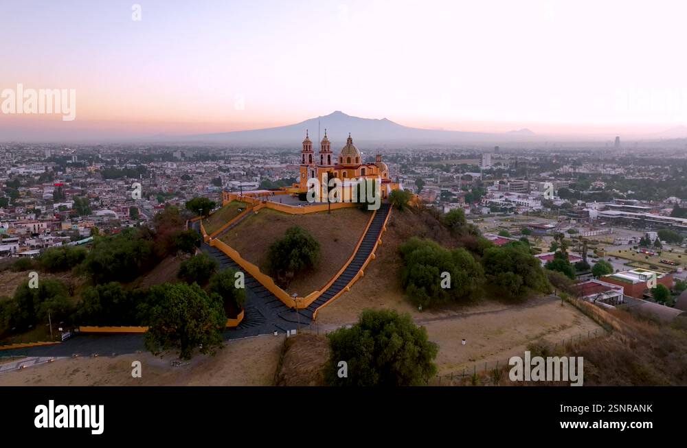 Great pyramid of Cholula and the catholic church built atop at sunset ...