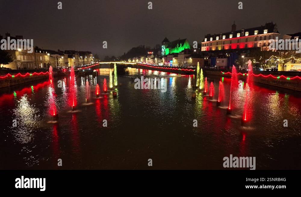 Panorama view of jet of water between Chateau Neuf and Laval Castle at ...